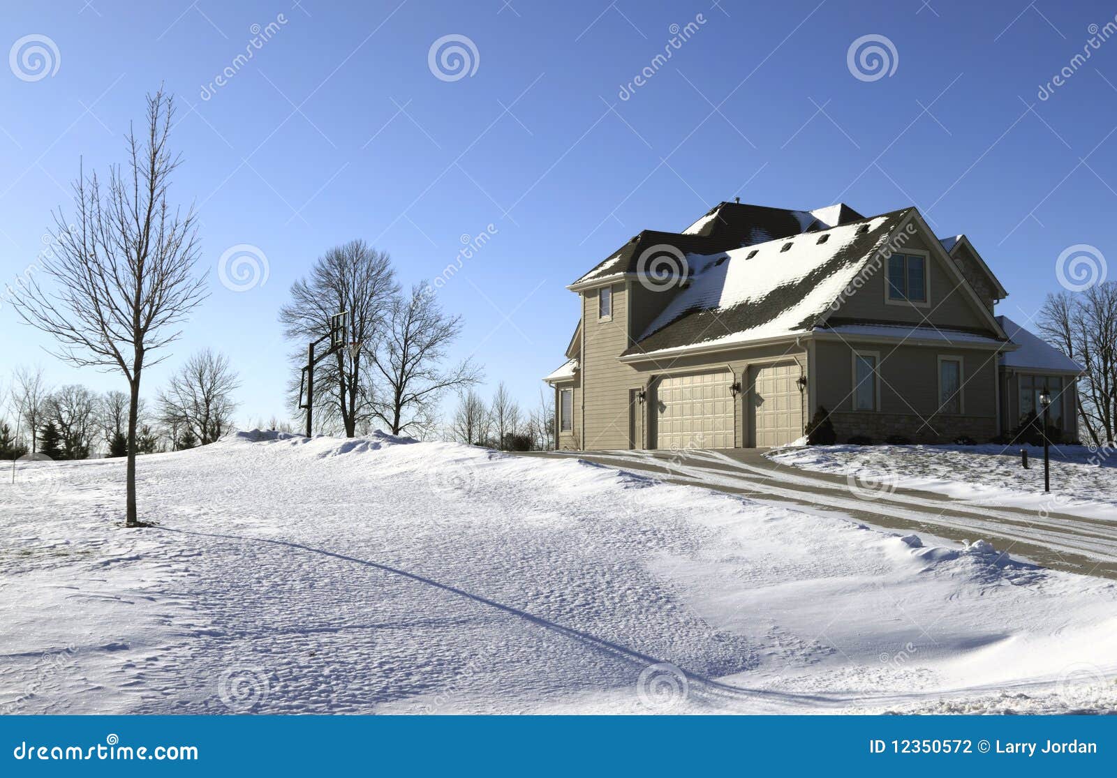 Suburban Home in Snow stock photo. Image of suburbia - 12350572