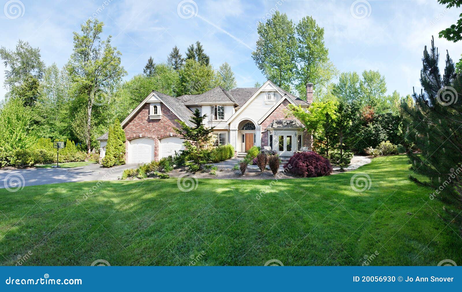 Suburban home in Spring stock photo. Image of sunny, spring - 20056930