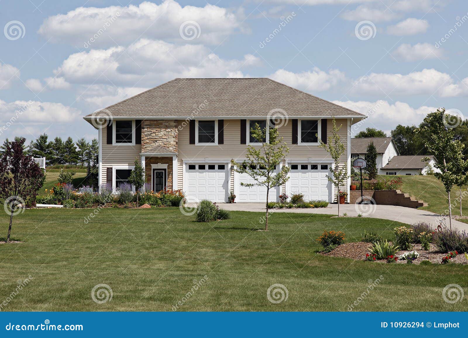 Suburban Home with Three Car Garage Stock Photo - Image of family ...