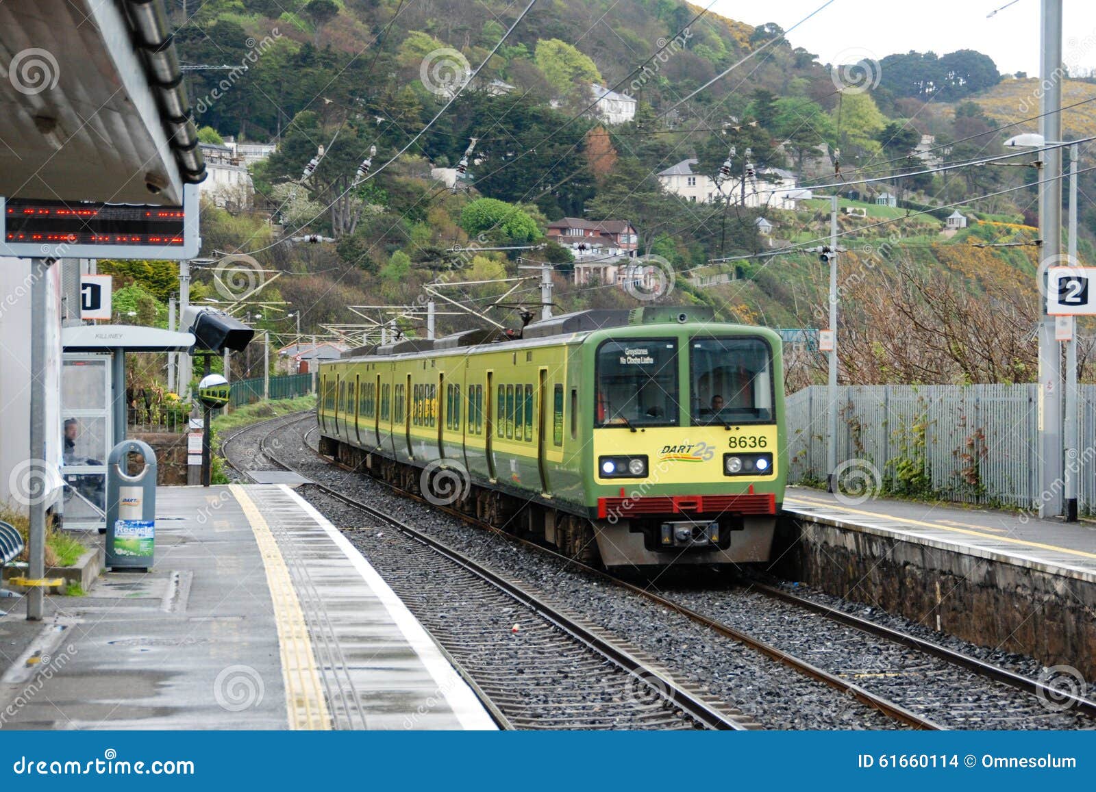 Suburban Train Approaching Station Editorial Stock Image - Image of ...
