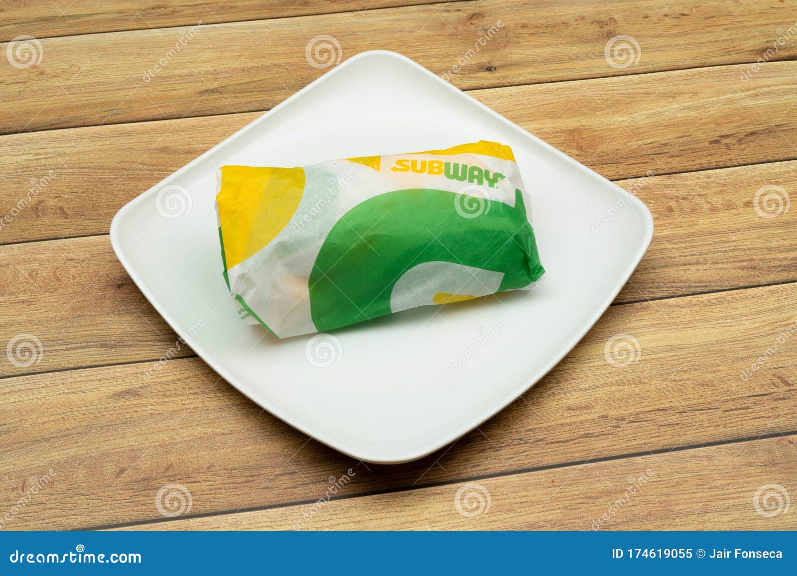 Subway Sandwich In A Packaging With Soft Drink In A Plastic Cup On A ...