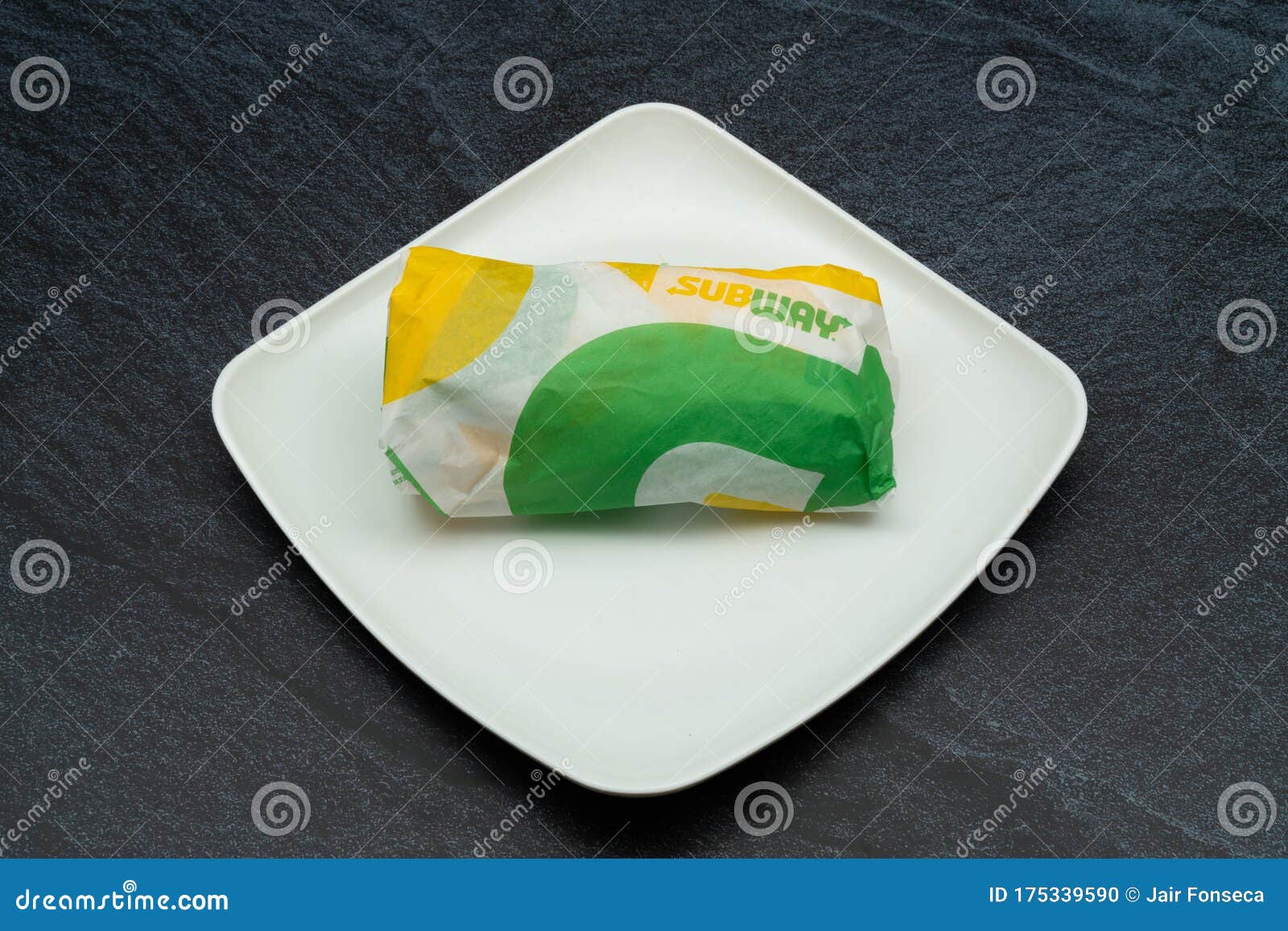 Subway Sandwich In A Packaging With Soft Drink In A Plastic Cup On A ...