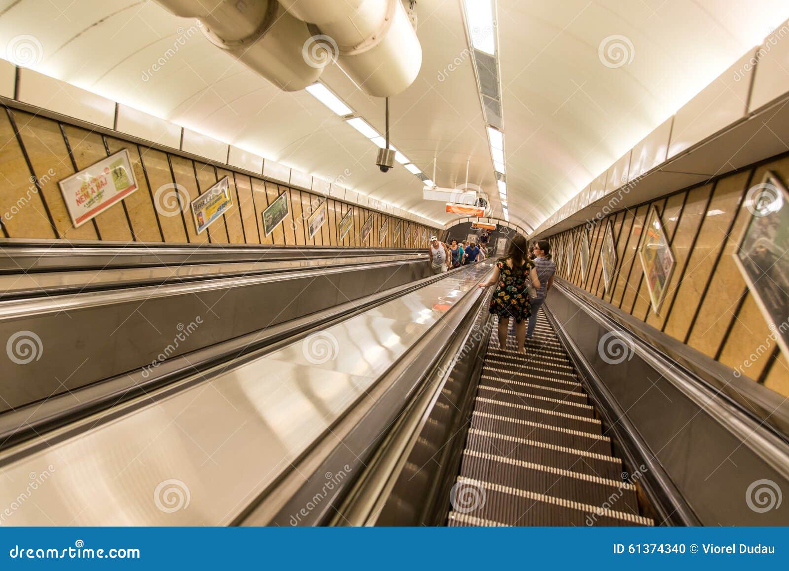 Underground Passage With Metal Stairs Leading To A Building Covered In ...
