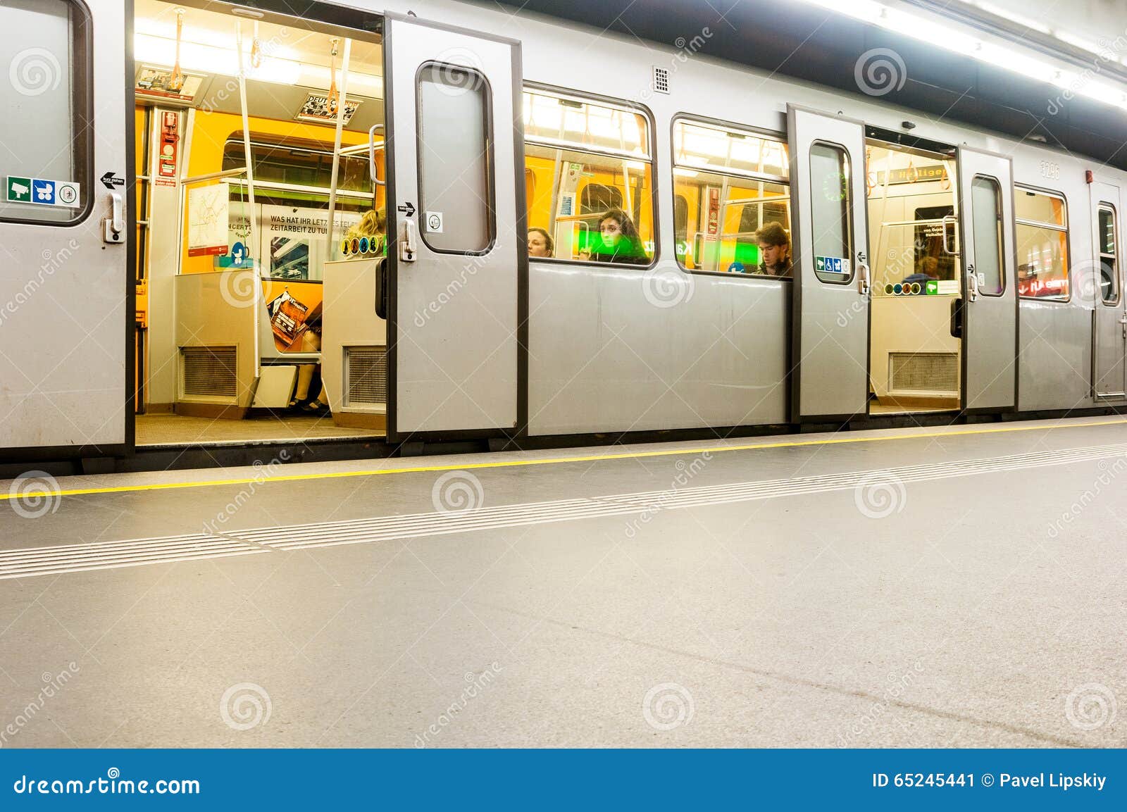 Subway Train and Passengers at Karlsplatz Station, Vienna, Austria ...