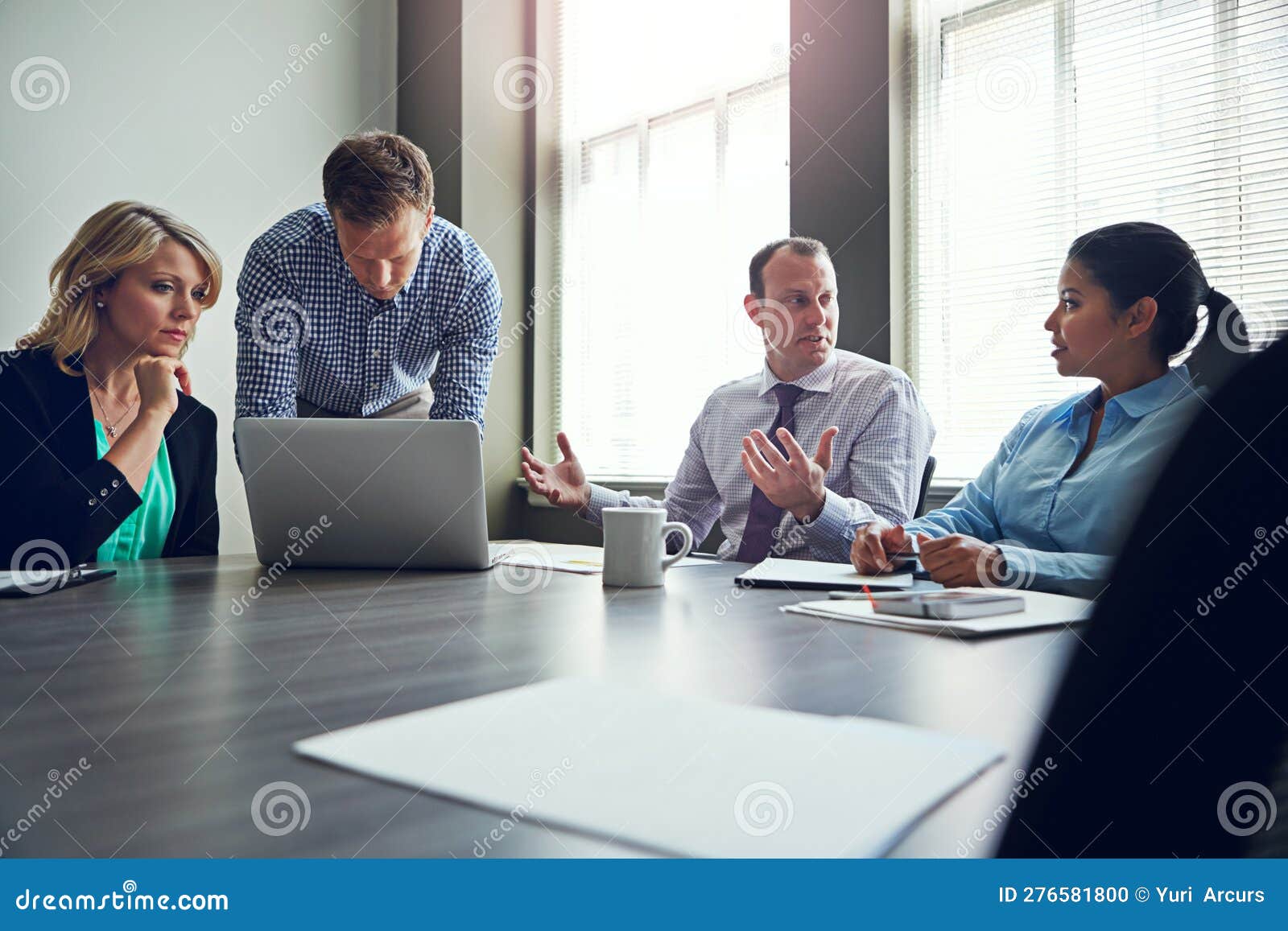 The Success Builders. a Group of Colleagues Having a Meeting in the ...