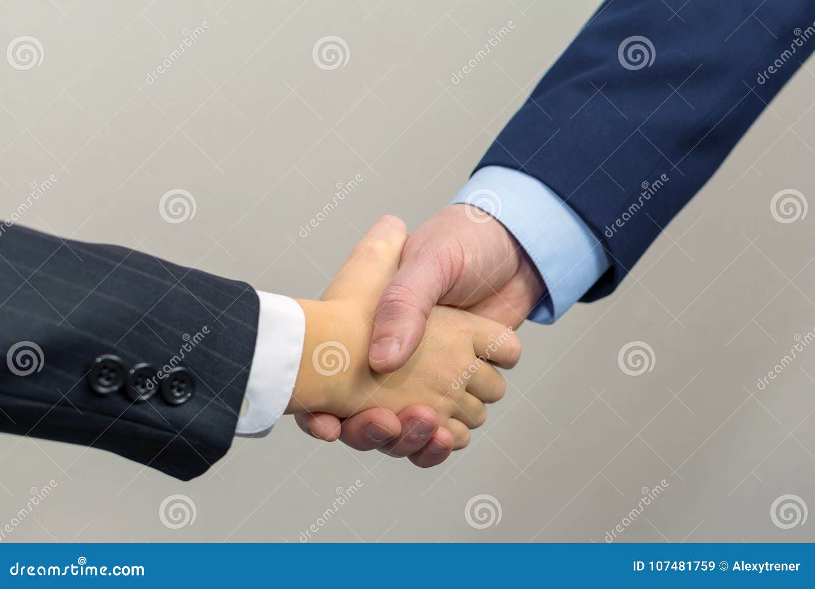 Success Concept in Business - Handshake of Man and Kid. Stock Image ...