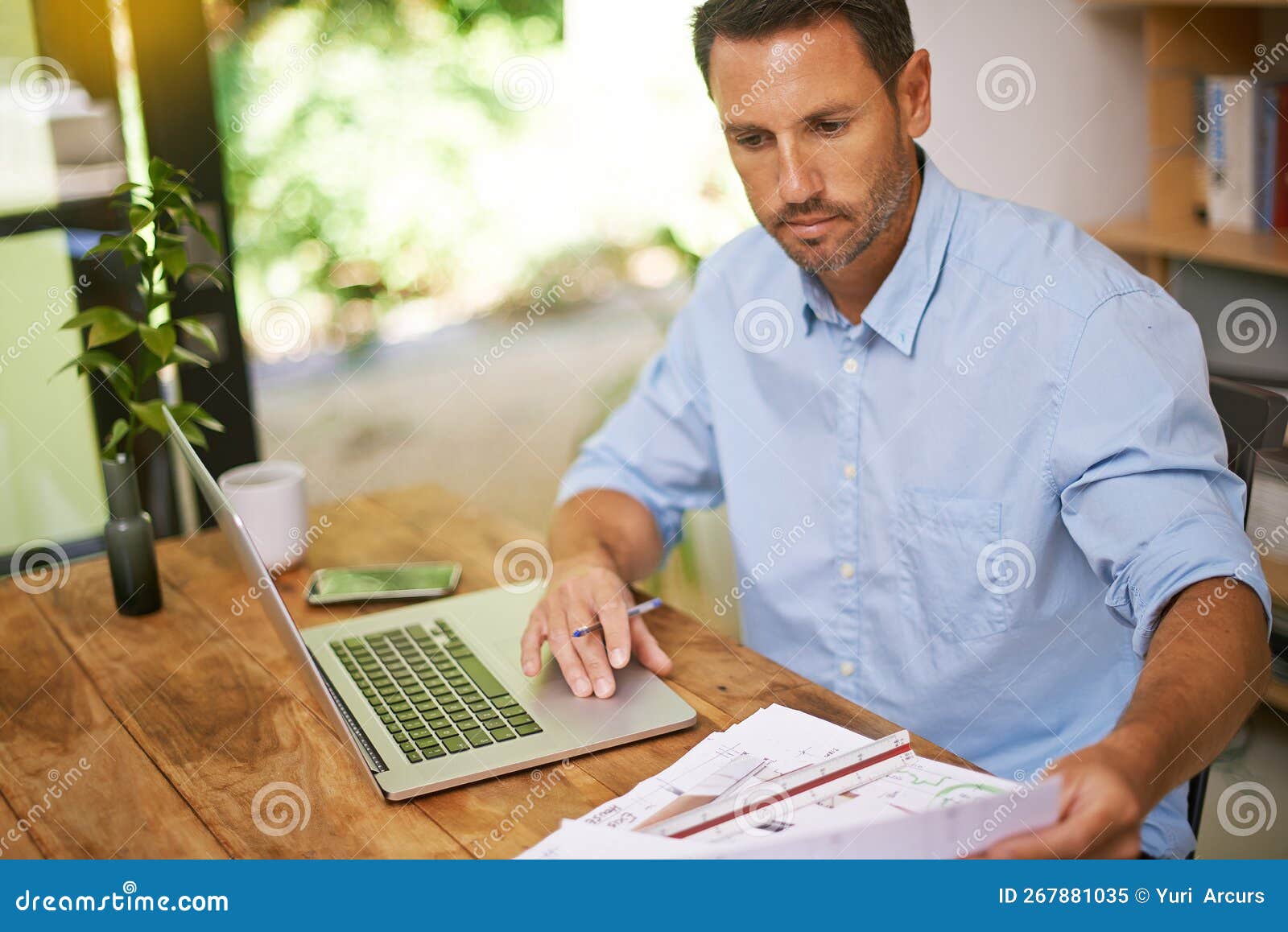 Success is in the Details. a Young Man Working from Home. Stock Image ...