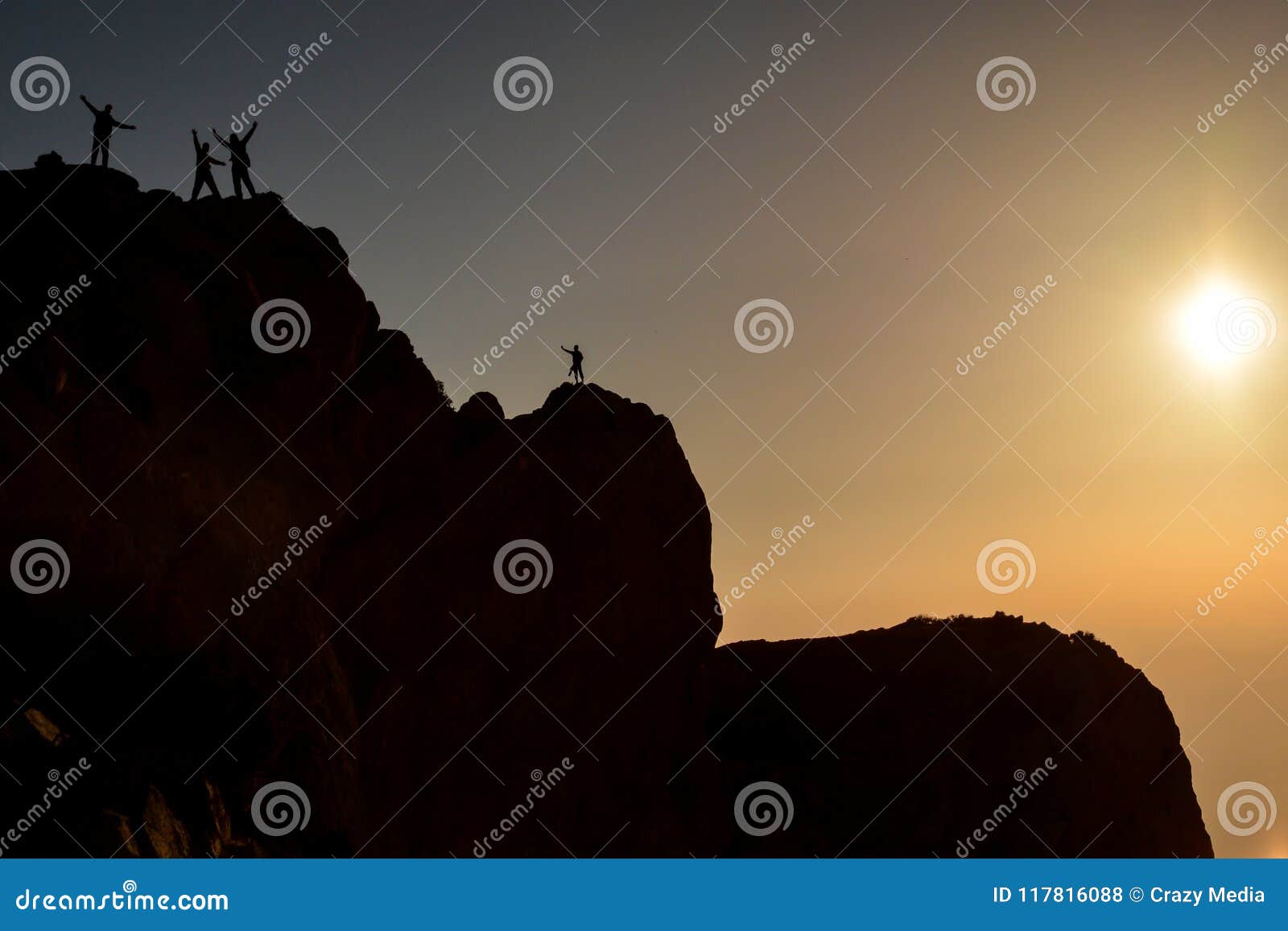 The Success of the Mountain Climbers on the Summit Rocks Stock Photo ...