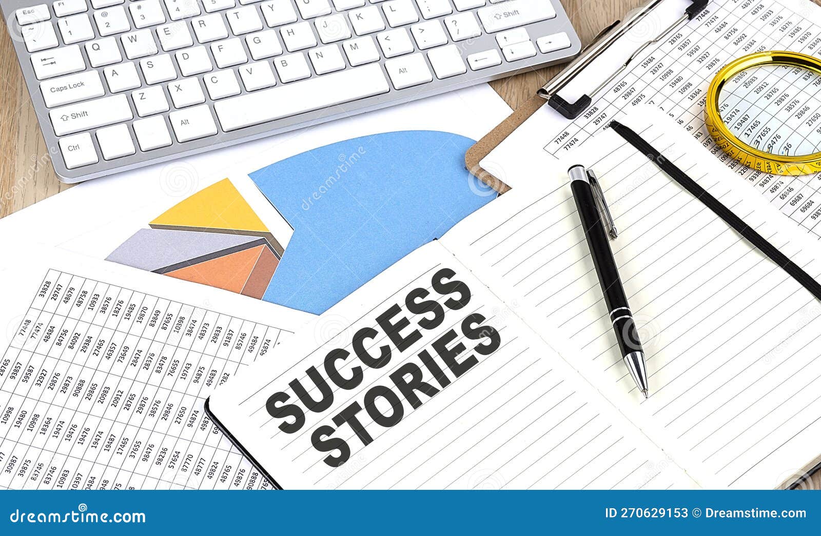 SUCCESS STORIES Text on Notebook with Chart and Keyboard Stock Image ...