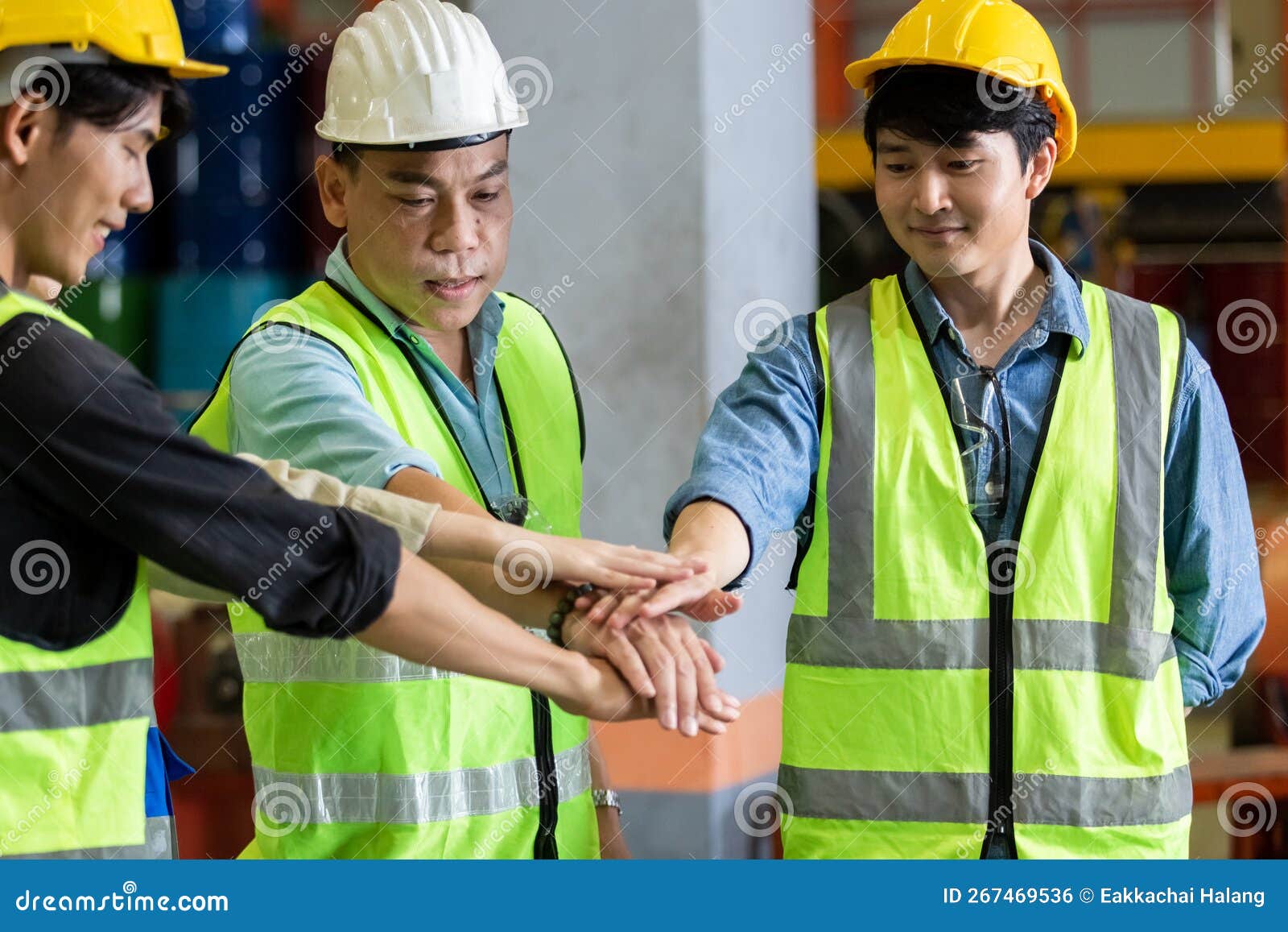 Success Teamwork Concept. Engineer Factory Group Joining Hands ...