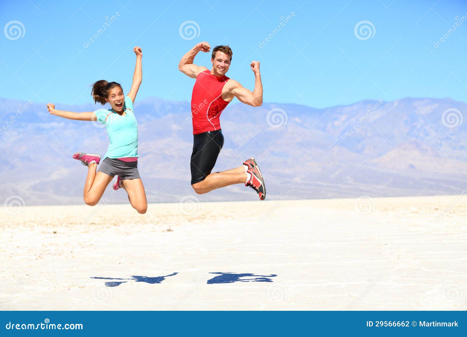 Success - Young Runners Jumping Stock Photo - Image of energetic ...