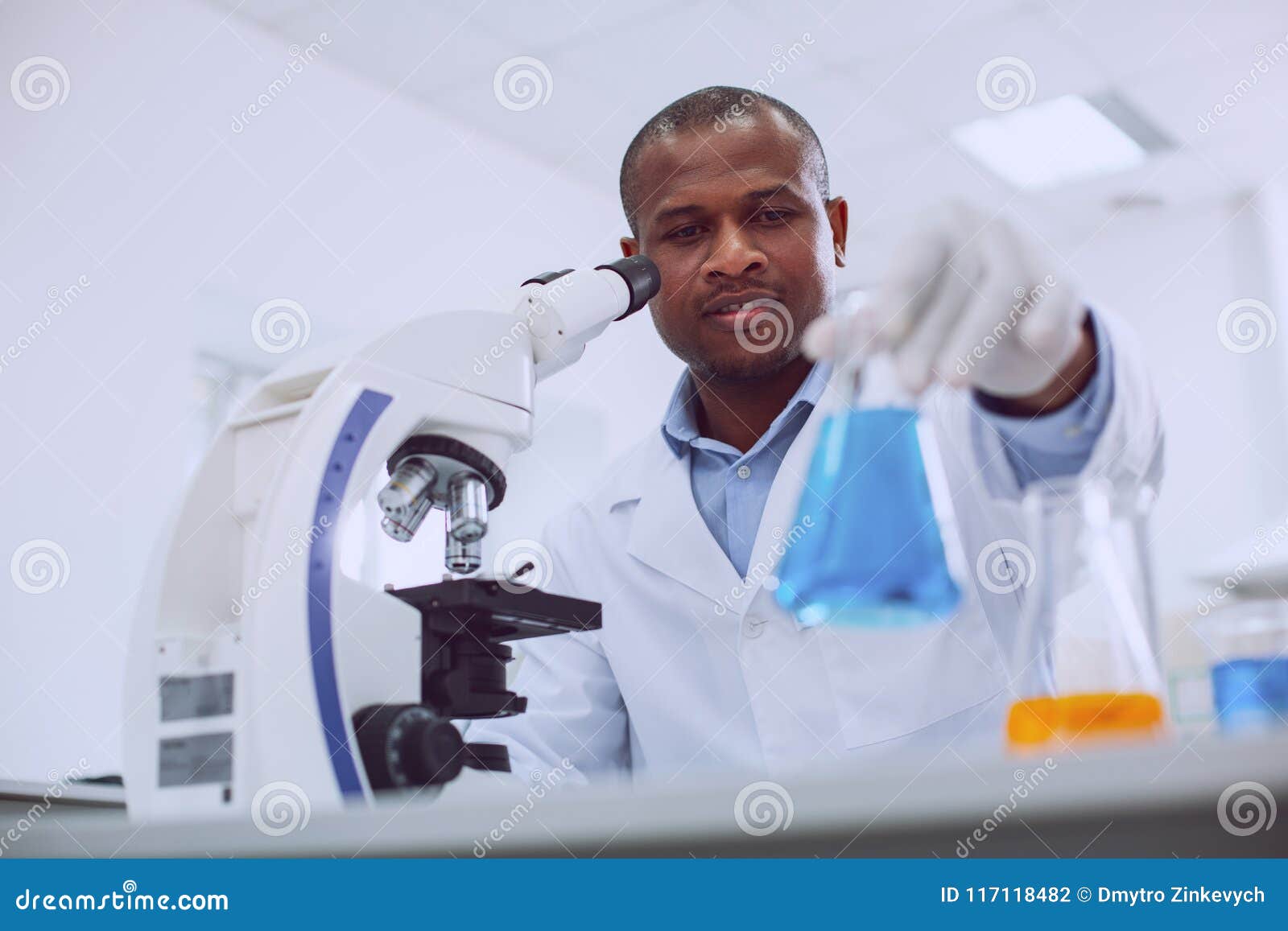 Successful Biologist Working with His Microscope Stock Photo - Image of ...