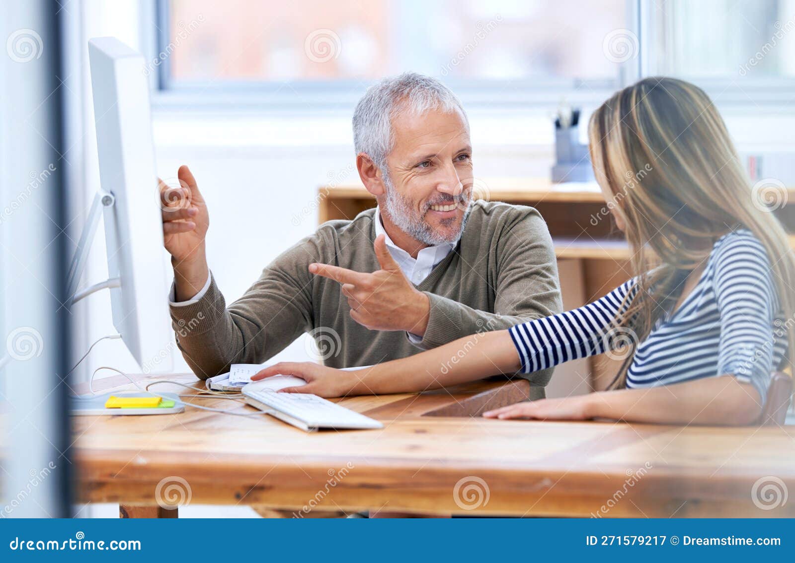 Successful Brainstorming. a Pair of Coworkers Happily Cooperating on a ...