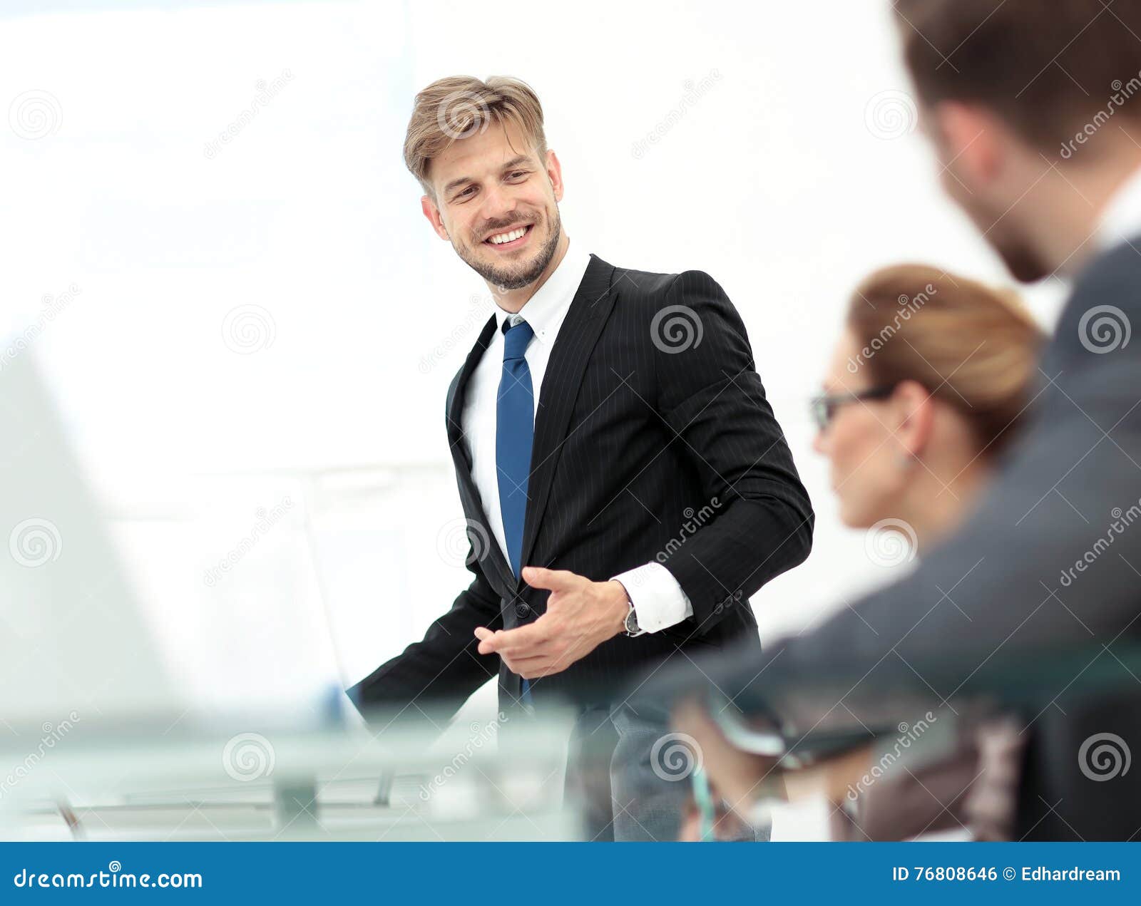 Successful Business Man in Suit at the Office Leading a Group Stock ...