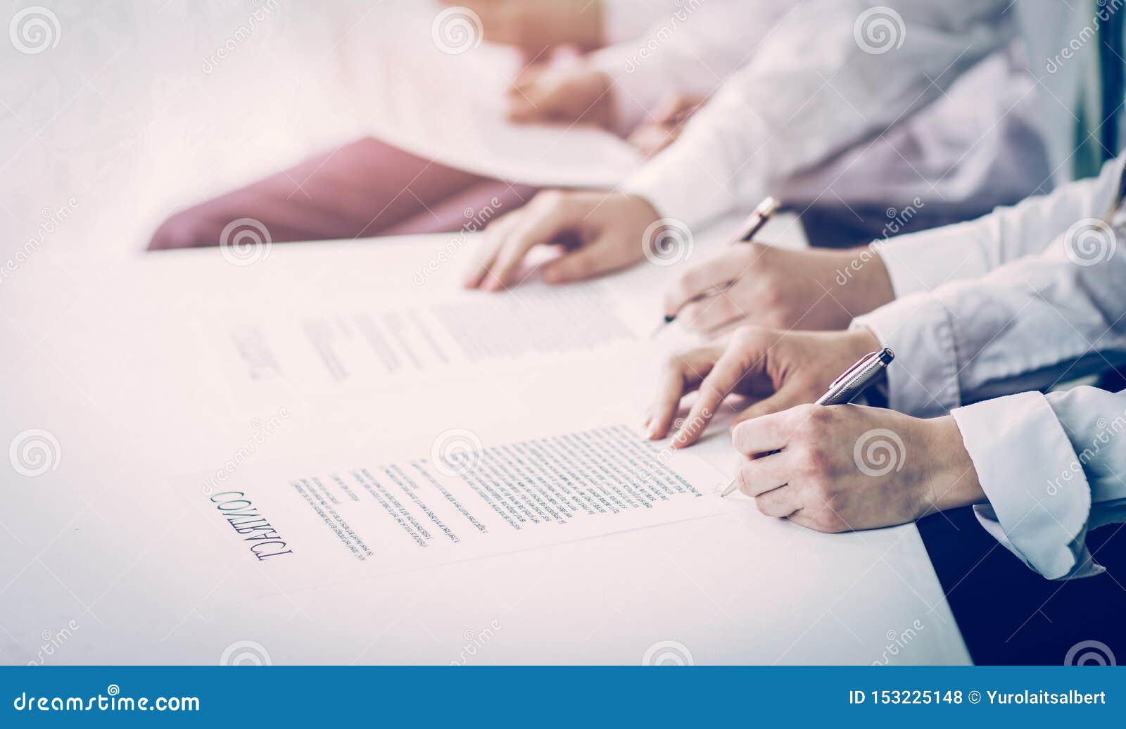 Successful Business Team Discussing a New Contract at the Workpl Stock ...