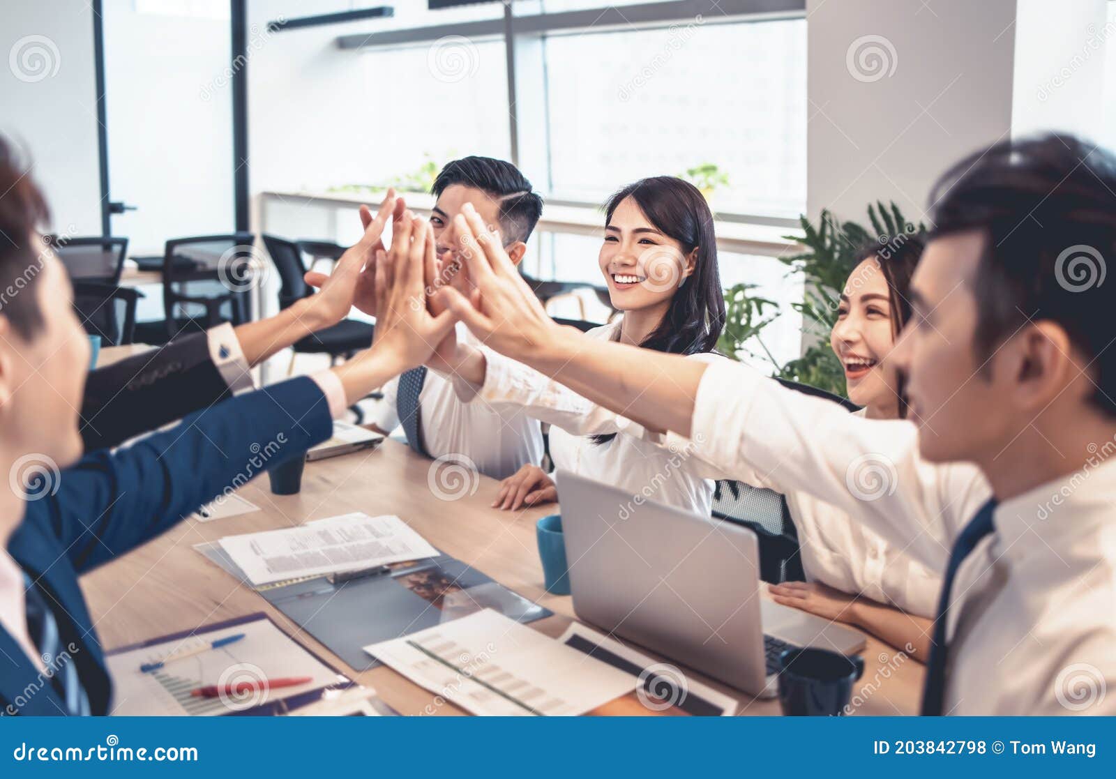 Team Showing Unity, People Putting Their Hands Together Stock Image ...