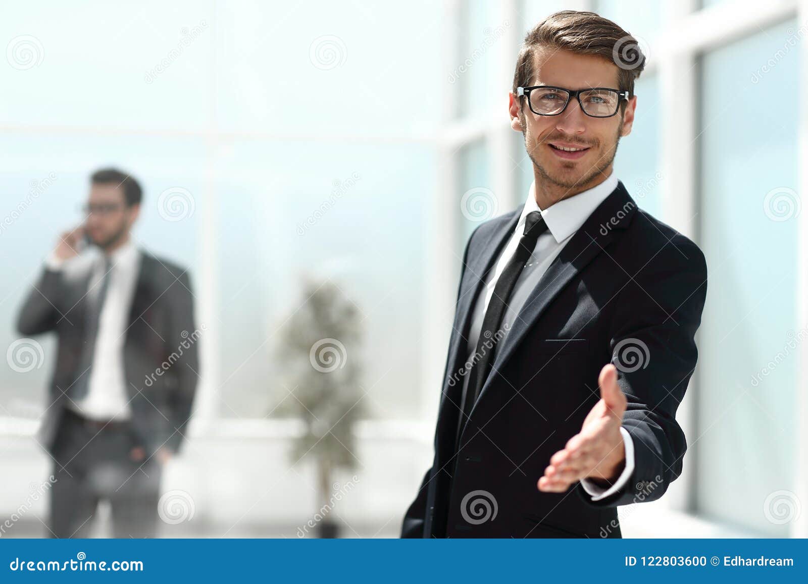 Successful Businessman Reaching Out for a Handshake Stock Photo - Image ... Successful Businessman Reaching Out for a Handshake Stock Photo - Image ...