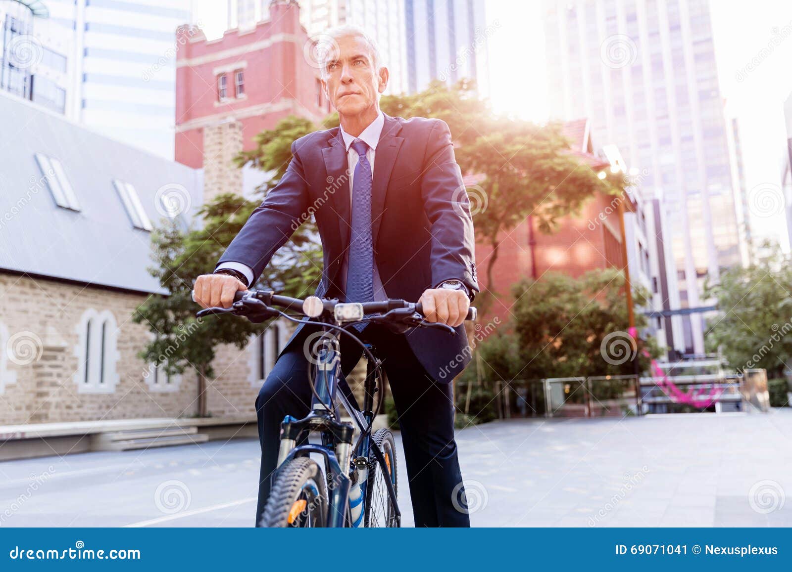 Successful Businessman Riding Bicycle Stock Image - Image of riding ...