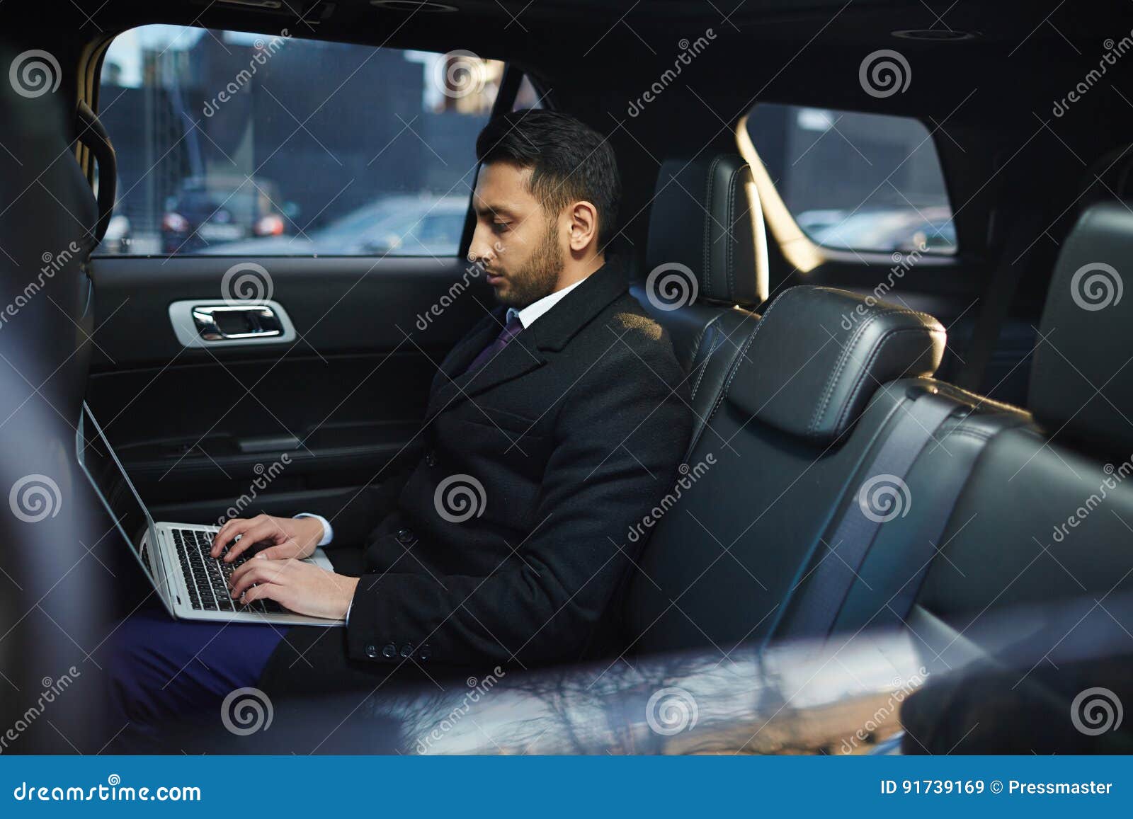 Successful Businessman Using Laptop in Car Stock Image - Image of ...