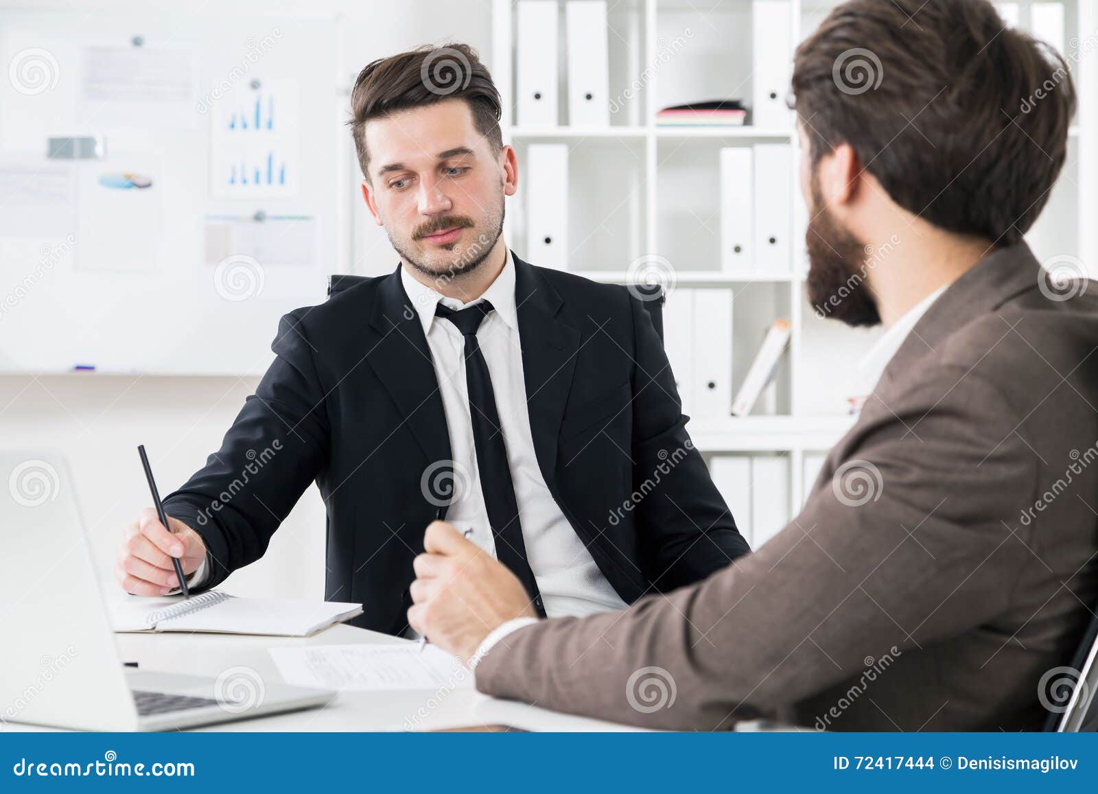 Successful Businessmen Discussing Something Stock Photo - Image of male ...