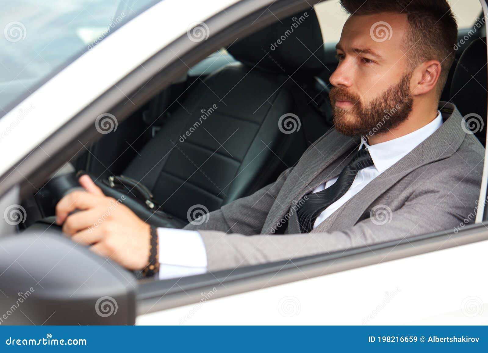 Successful Caucasian Man in Formal Suit Driving a Car Stock Image ...