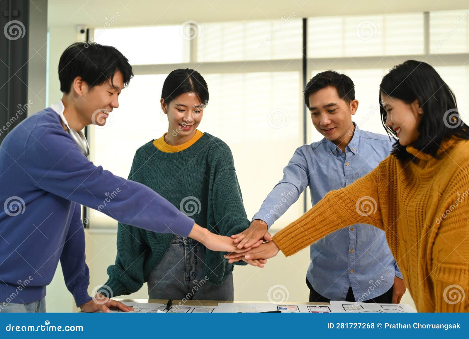 Successful Creative Business Team Stacking Hands Together, Celebrating ...