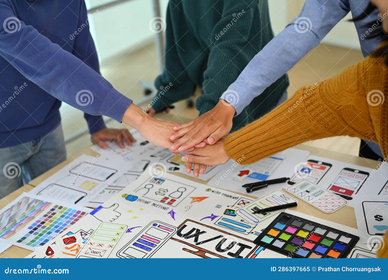 Successful Creative Business Team Stacking Hands Together, Celebrating ...