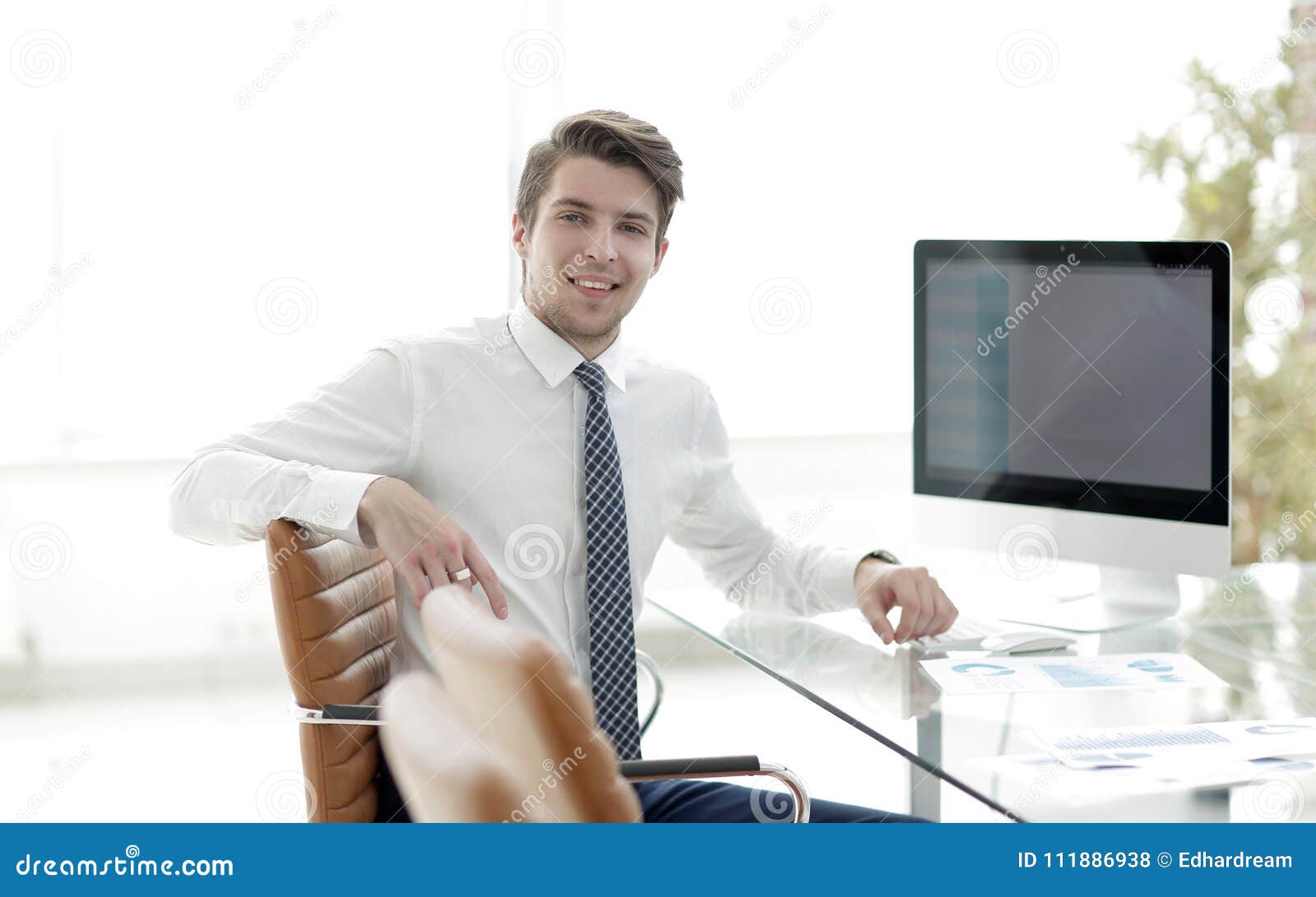 Employee Sitting in Front of a Computer Screen Stock Photo - Image of ...