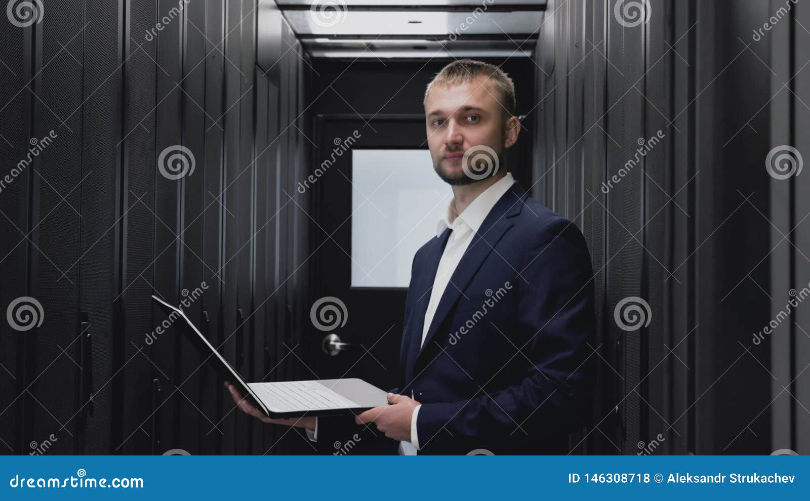 It Engineer Face Portrait with Laptop in Server Room of Datacenter ...