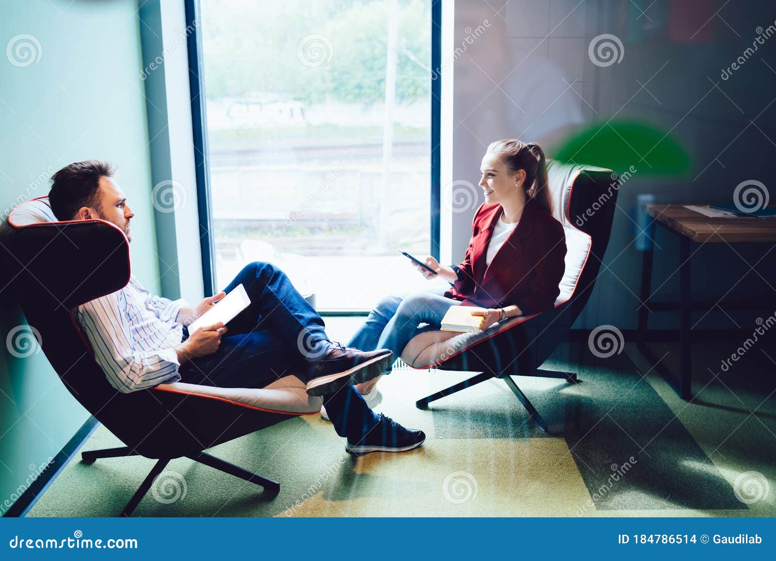 Successful Entrepreneur Communicating with Client in Modern Office ...