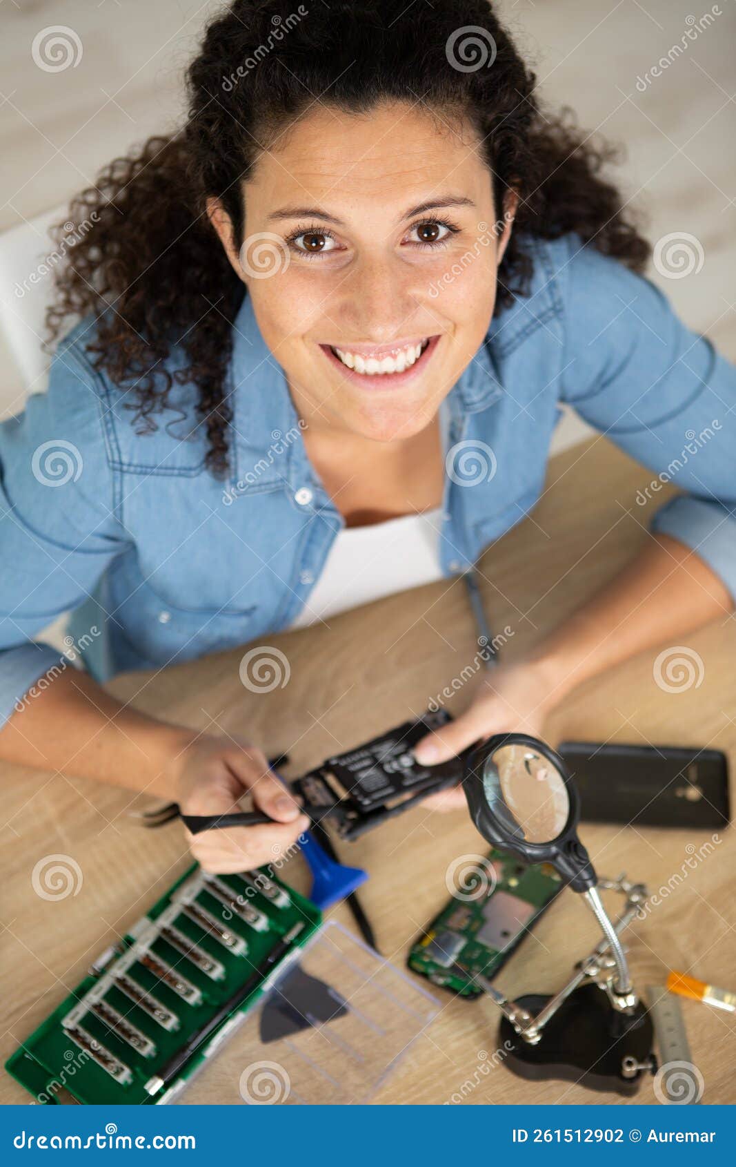 Successful Female Computer Technician Smiles at Camera Stock Photo ...