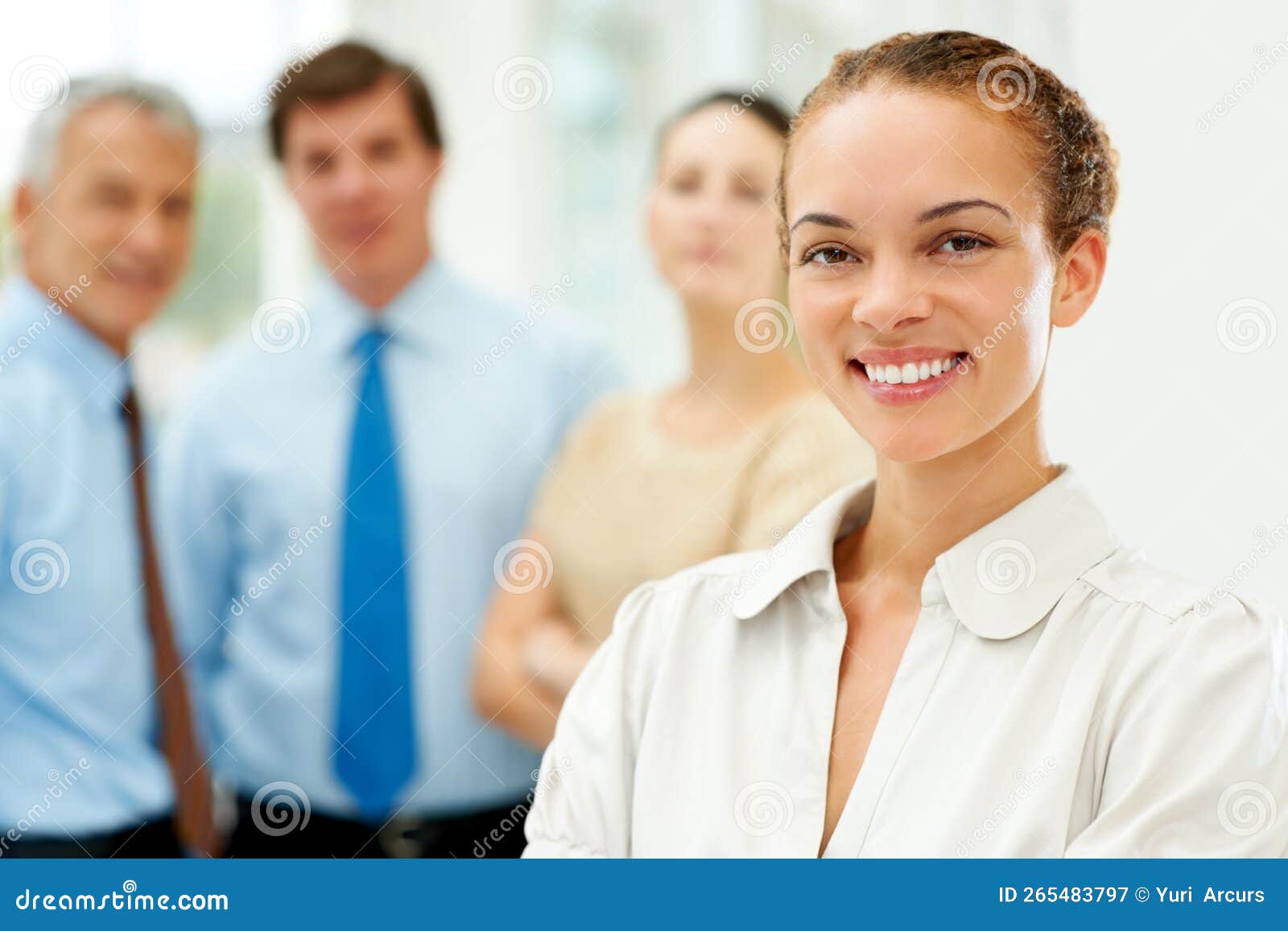 Successful Female Executive with Her Team in Background. Successful ...