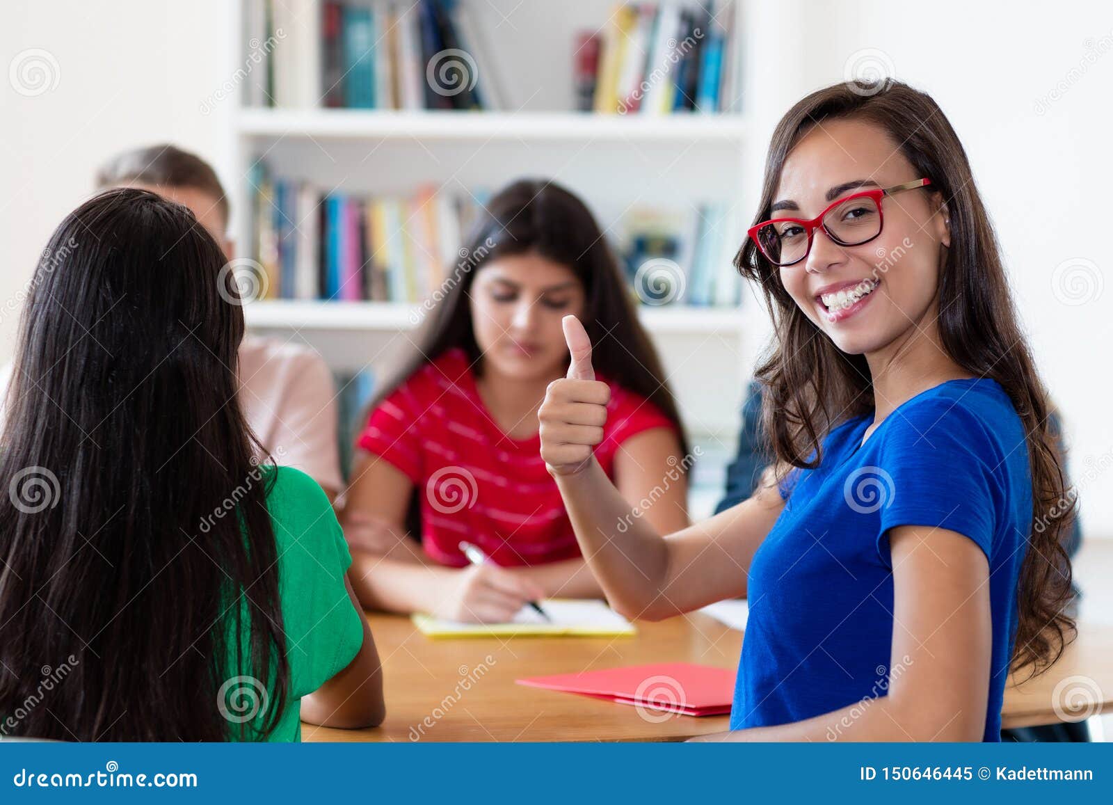 Successful French Female Student Learning with Group of Students Stock ...