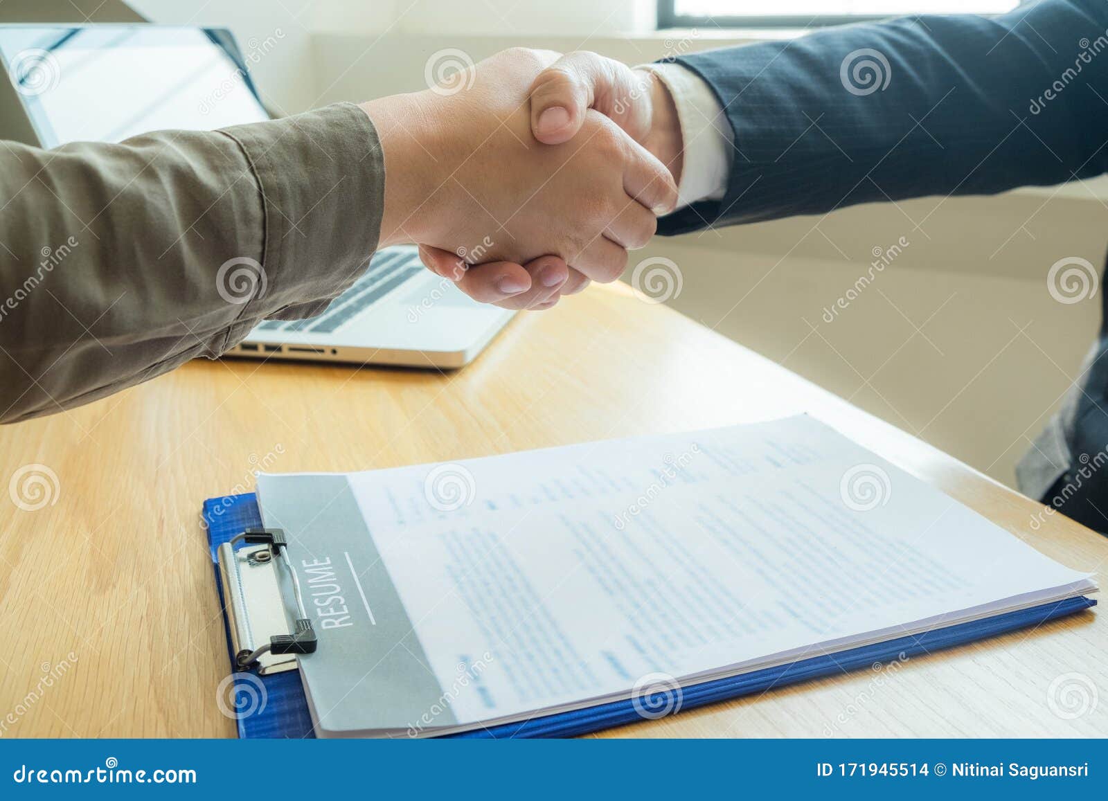 Successful Handshake in Presenting Resume for Work in the Company Stock ...
