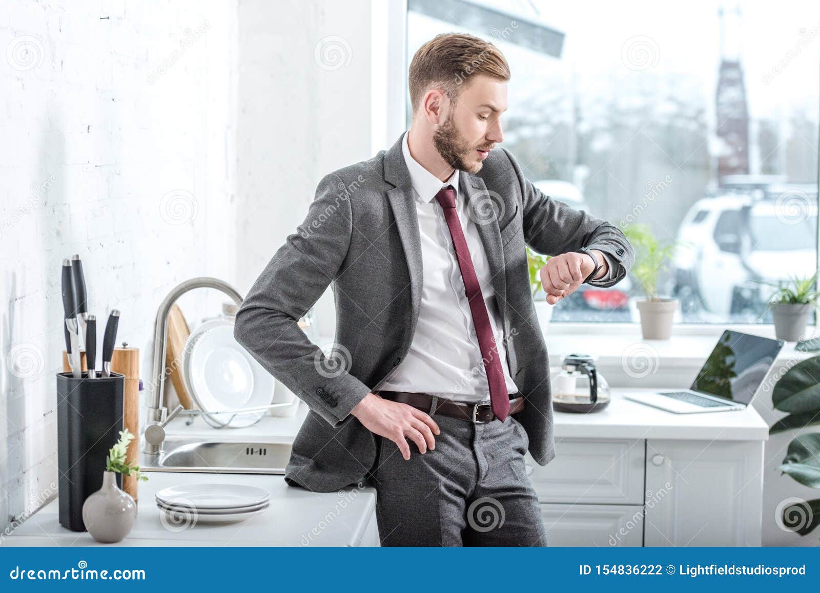 Successful Handsome Businessman Looking at Watch Stock Photo - Image of ...