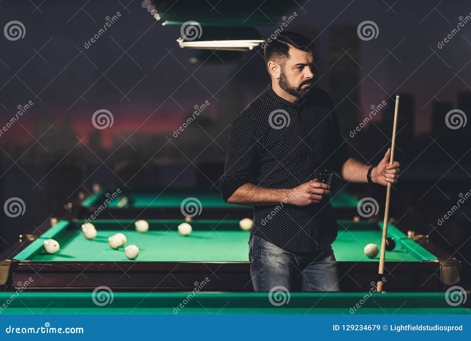 Successful Handsome Man Standing beside Pool Table with Drink Stock ...