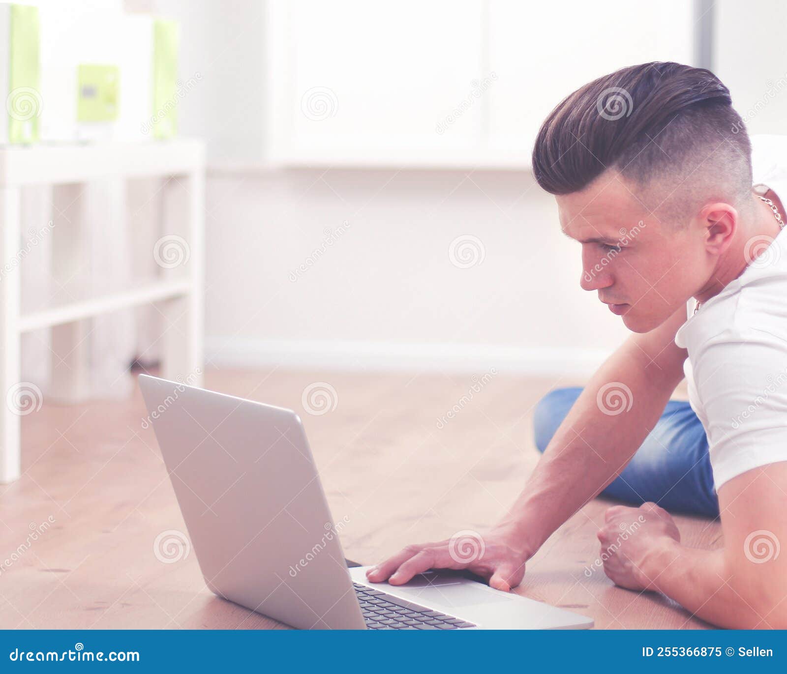 Successful Happy Man Lying Down O N Floor Using Laptop Stock Image ...