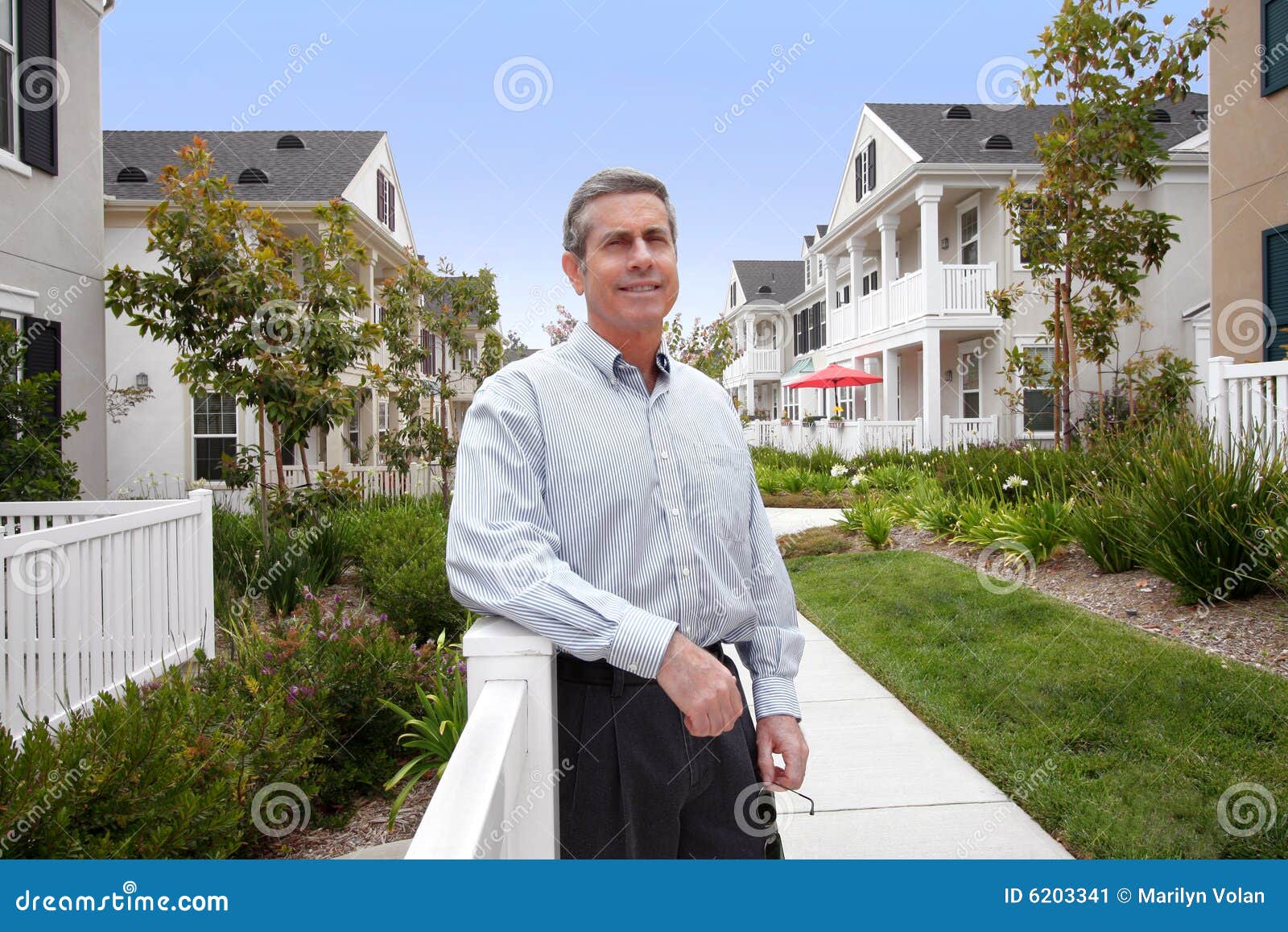 Successful Man by Houses stock image. Image of citizen - 6203341