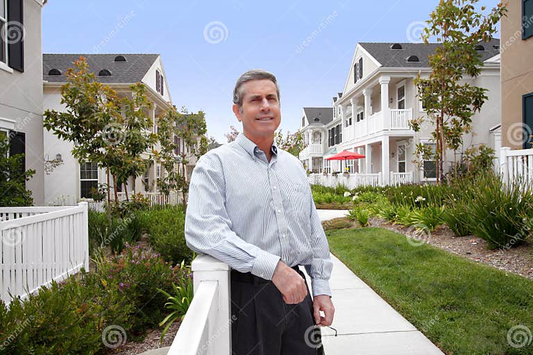 Successful Man by Houses stock image. Image of citizen - 6203341