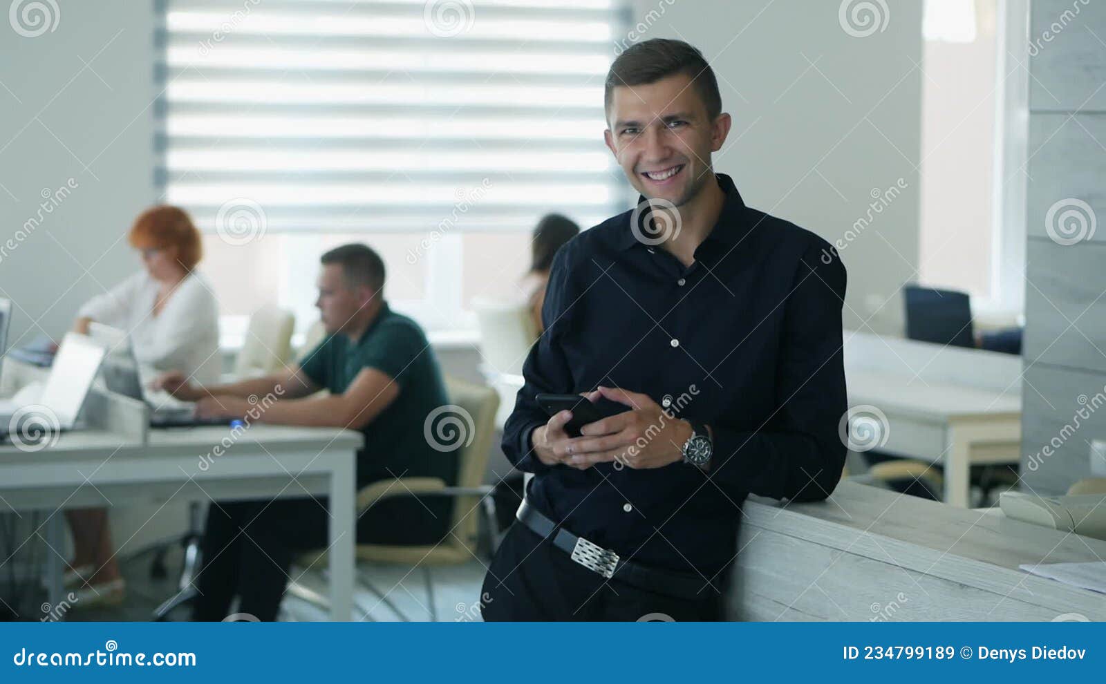 Successful Man in the Office, Looking at the Camera and Smiling Stock ...
