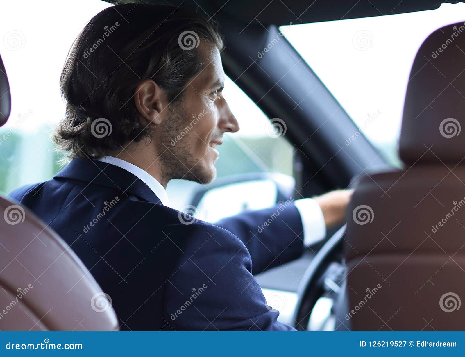 Successful Man Sitting Behind the Wheel of a Car Stock Image - Image of ...