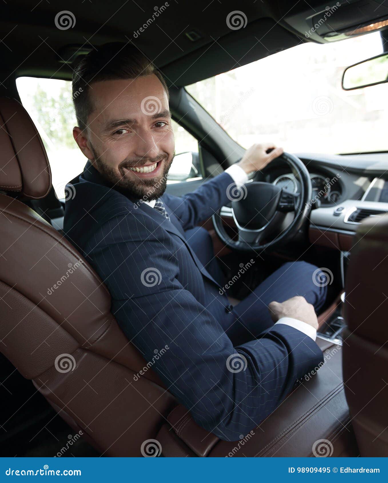 Successful Man Sitting Behind the Wheel of a Prestigious Car Stock ...