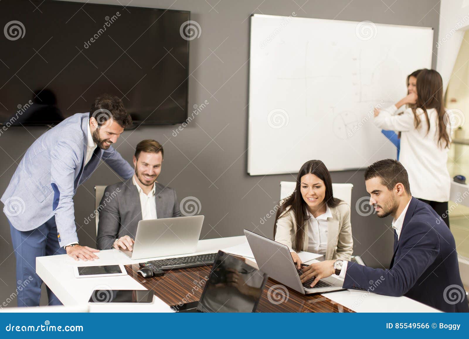 Successful Managers Discussing New Business Project in Mod Stock Photo ...
