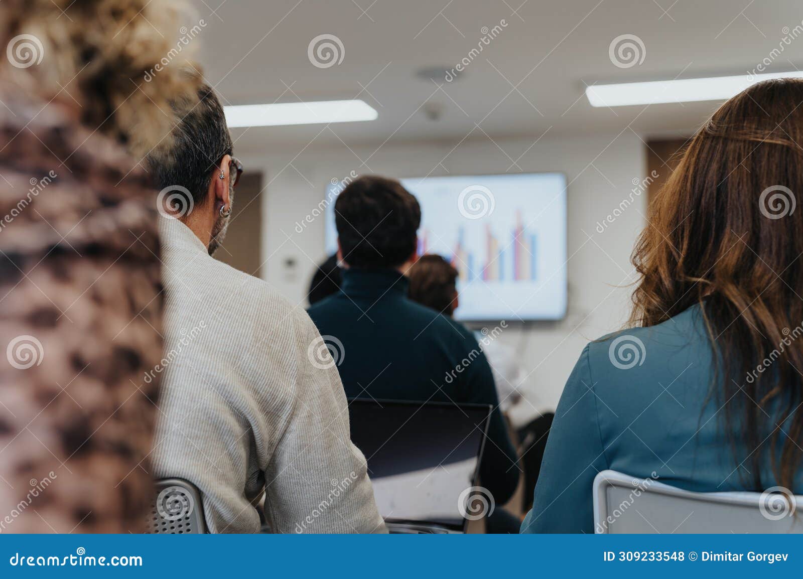 Successful Multi Generational Team Analyzing Growth and Brainstorming ...