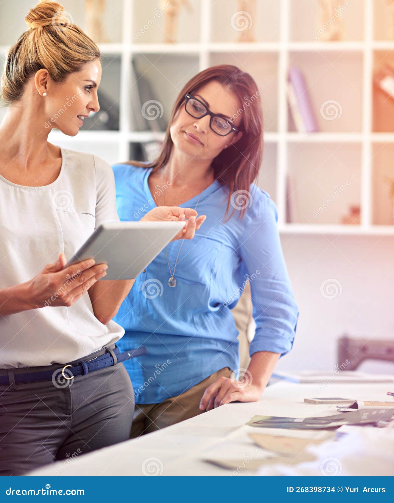 Successful Partners Problem Solve Together. Two Coworkers Using a ...