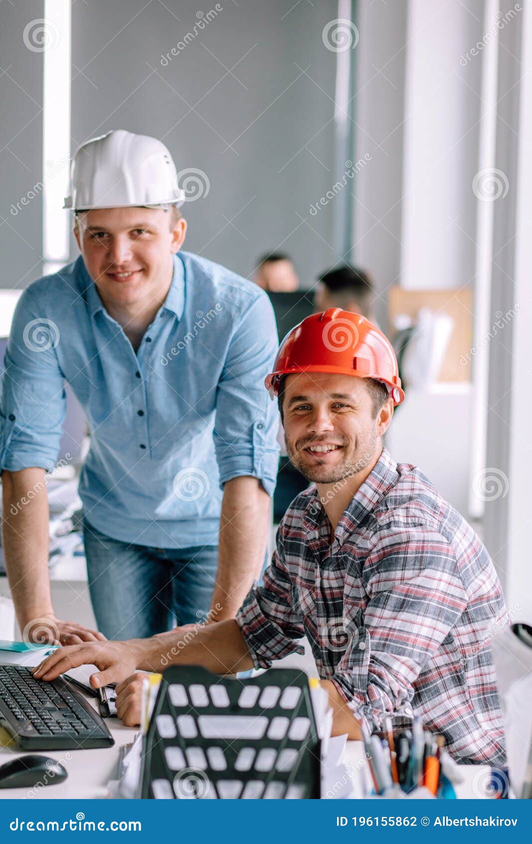 Successful Positive Engineers are Looking at the Camera Stock Photo ...
