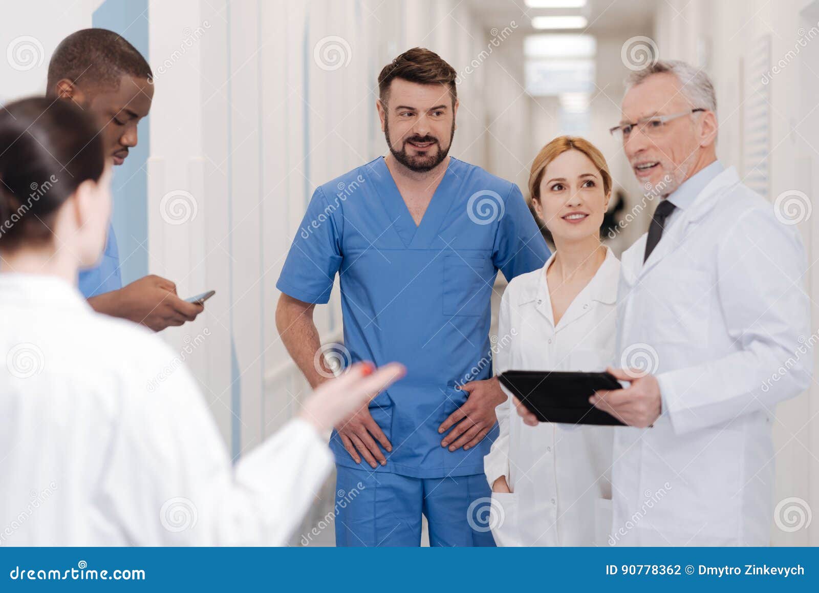 Successful Practitioners Enjoying Communication at Work Stock Photo ...