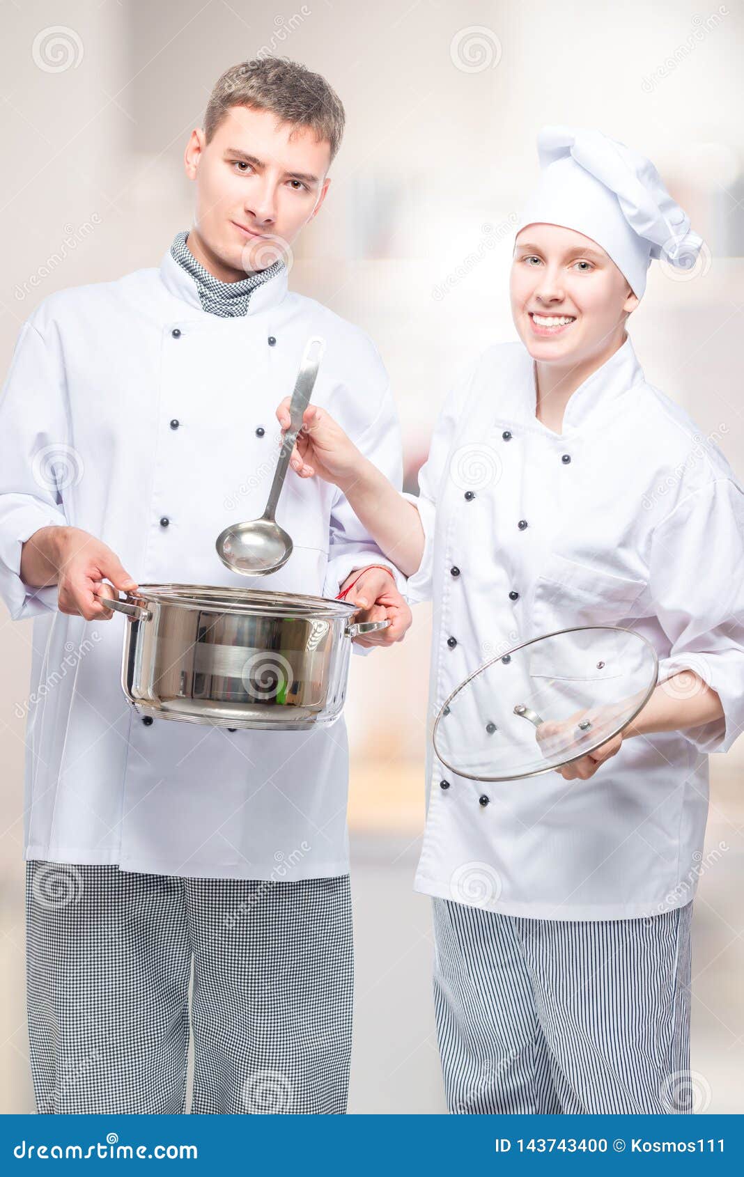 Successful Professional Chefs with a Pan and a Ladle in a Commercial ...