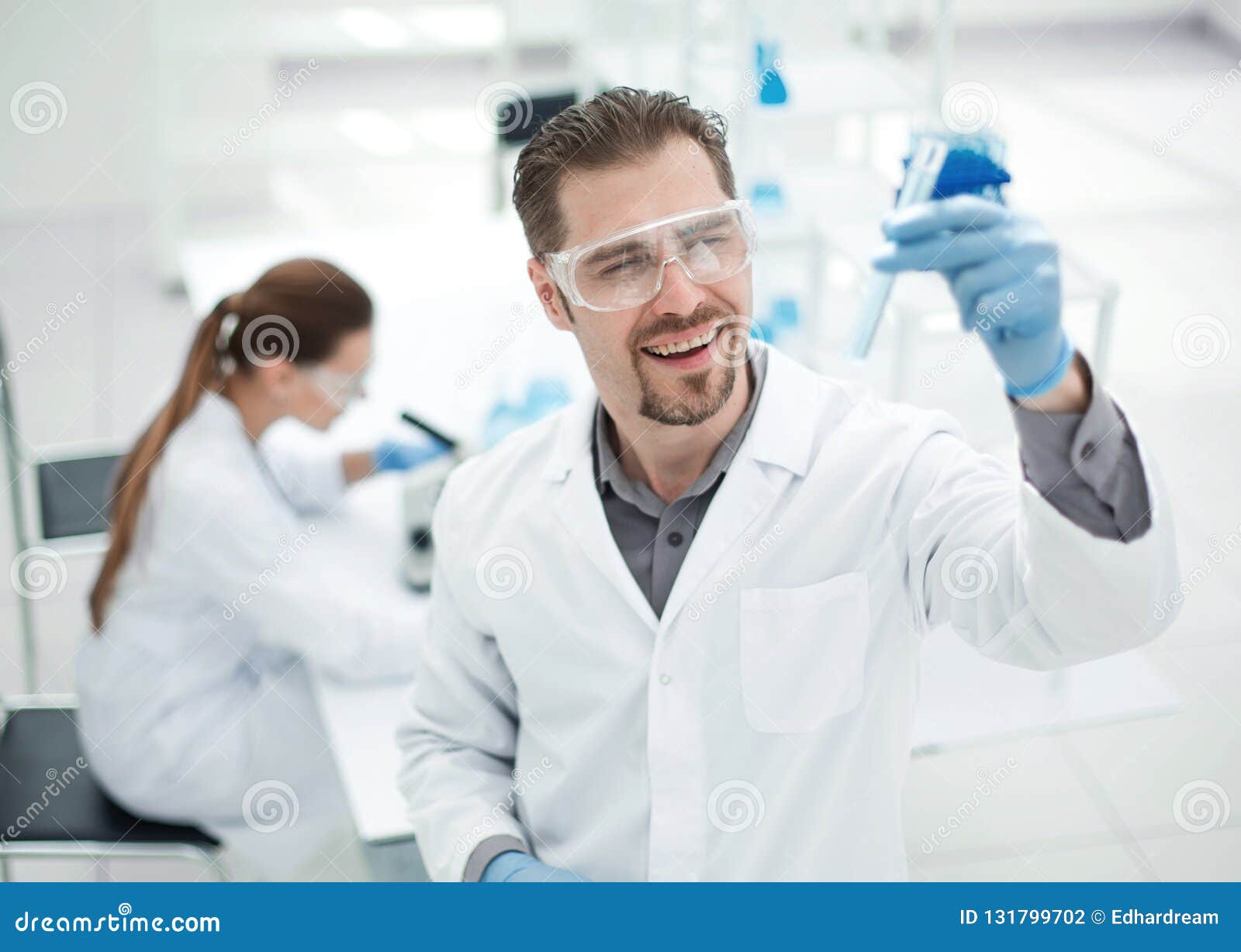 Successful Scientist Checking the Results of the Examination. Stock ...