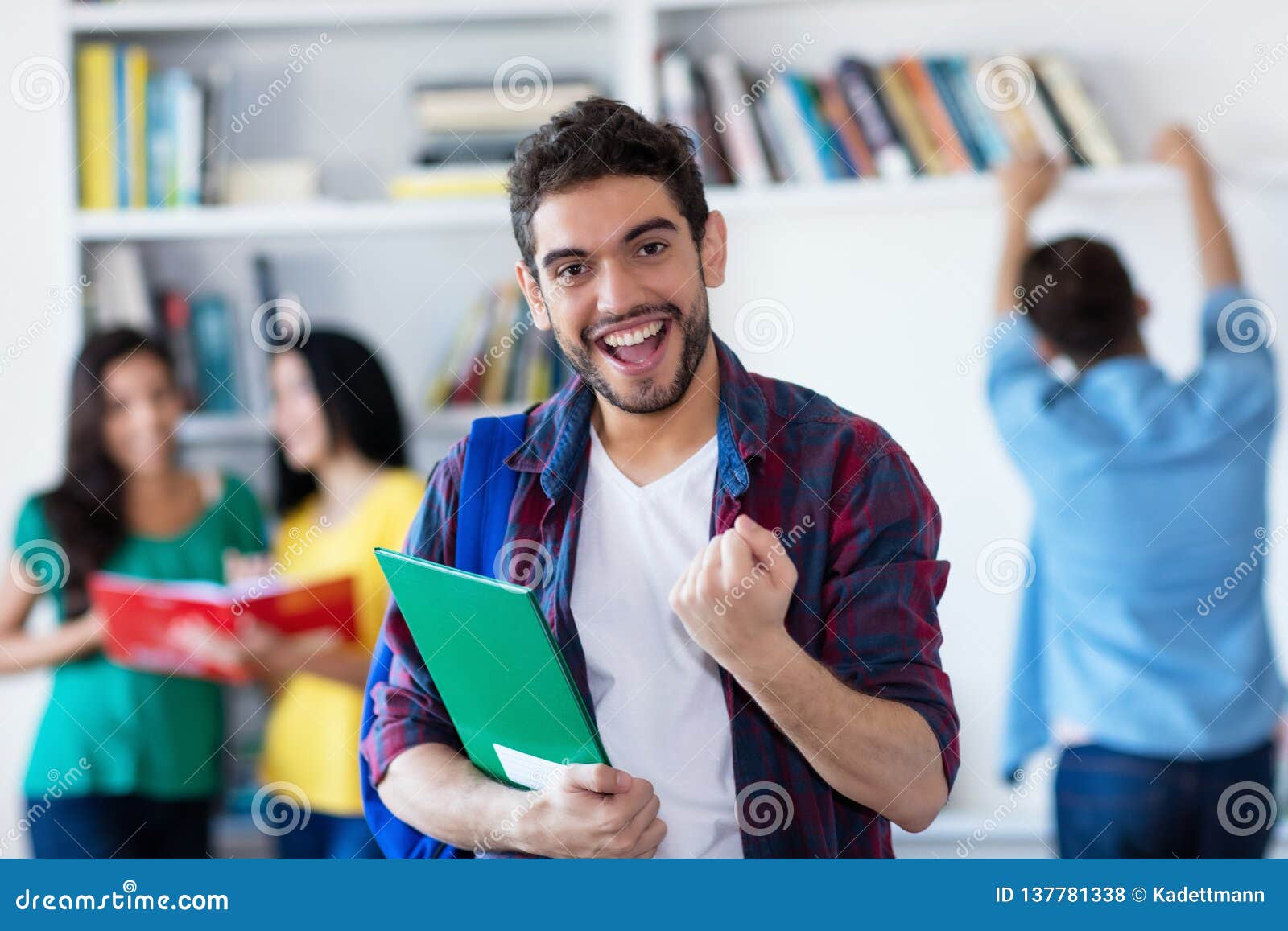 Successful Spanish Male Student with Group of Students Stock Photo ...